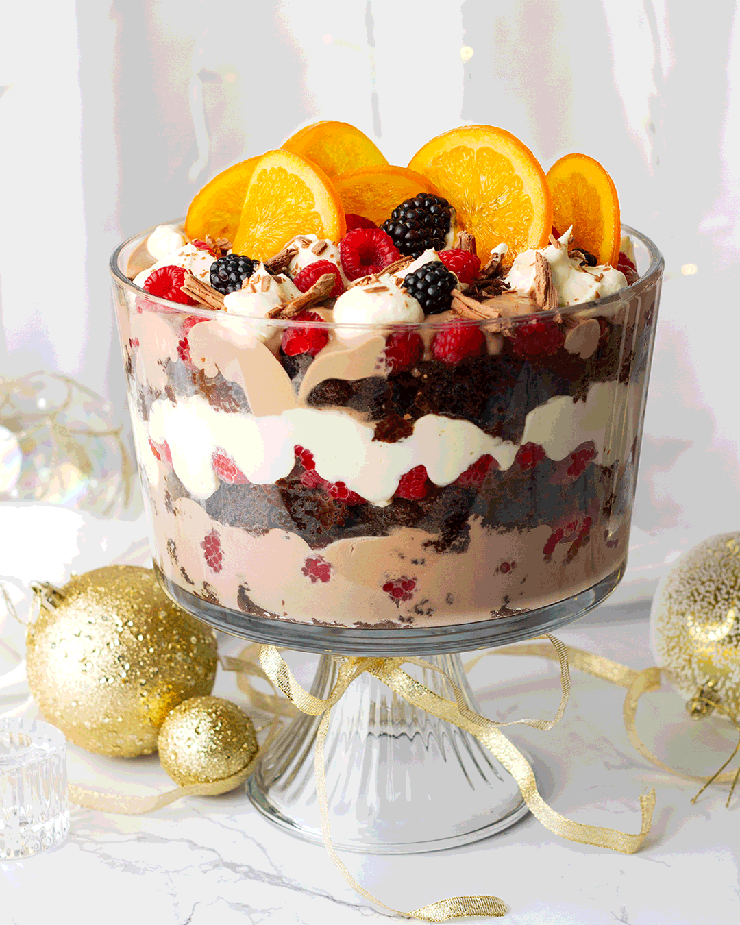 Noshu | Recipe - fudgy choc brownie trifle with berries & candied orange